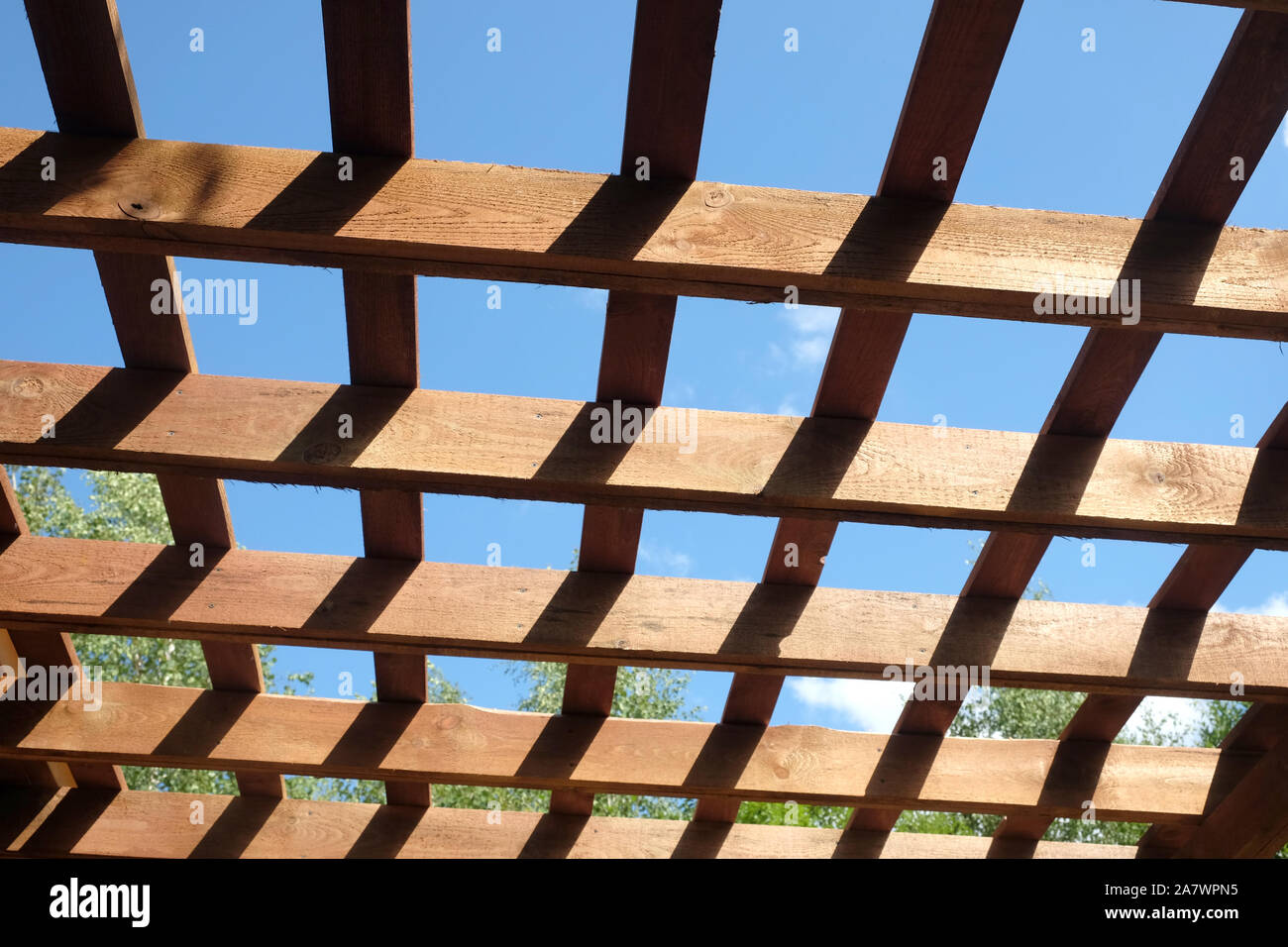 Top of brown wooden pergola on sunny summer day side view outdoor Stock ...