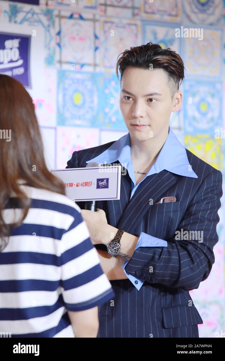 Hong Kong singer and actor William Chan attends a promotional event for ...