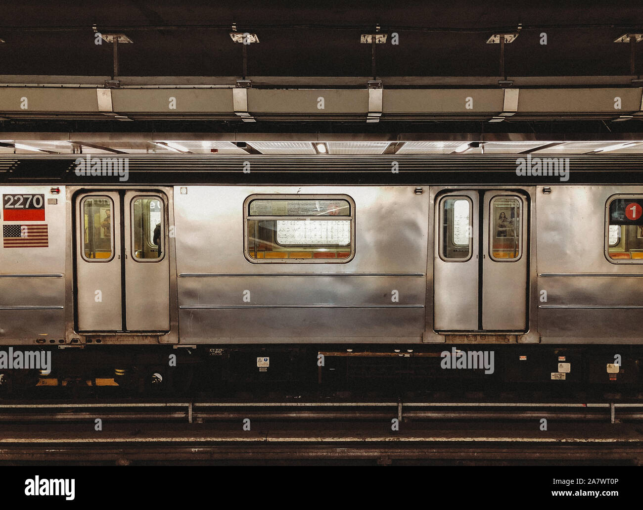 The outside of a passing subway train in New York City, New York, USA ...