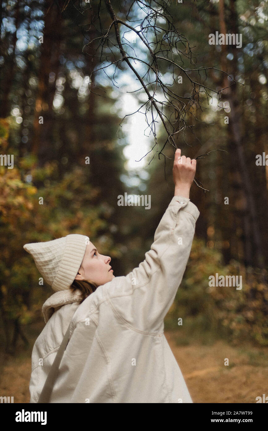 Back view of woman in forest Stock Photo - Alamy