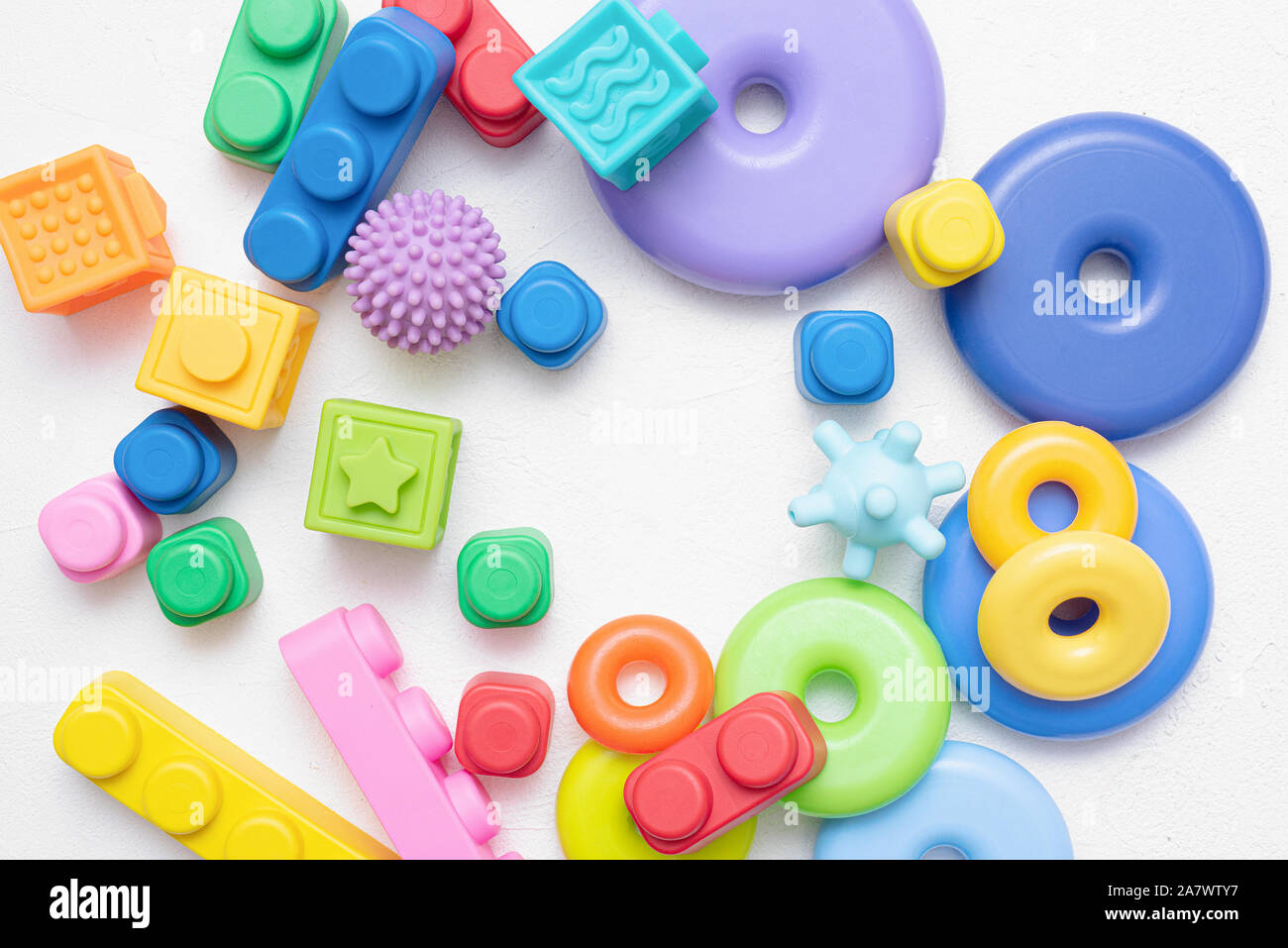 Baby toys flat lay background with copy space Stock Photo - Alamy