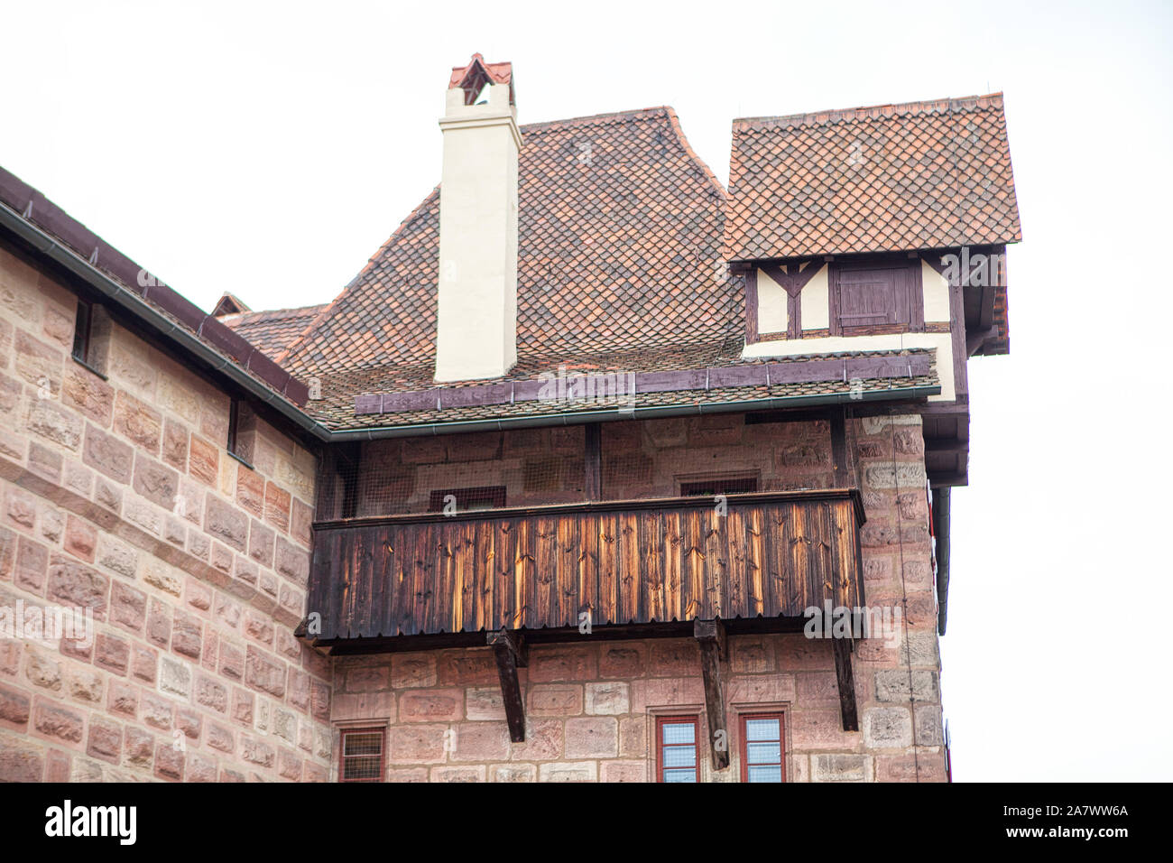 medieval wooden balcony of old church Stock Photo - Alamy