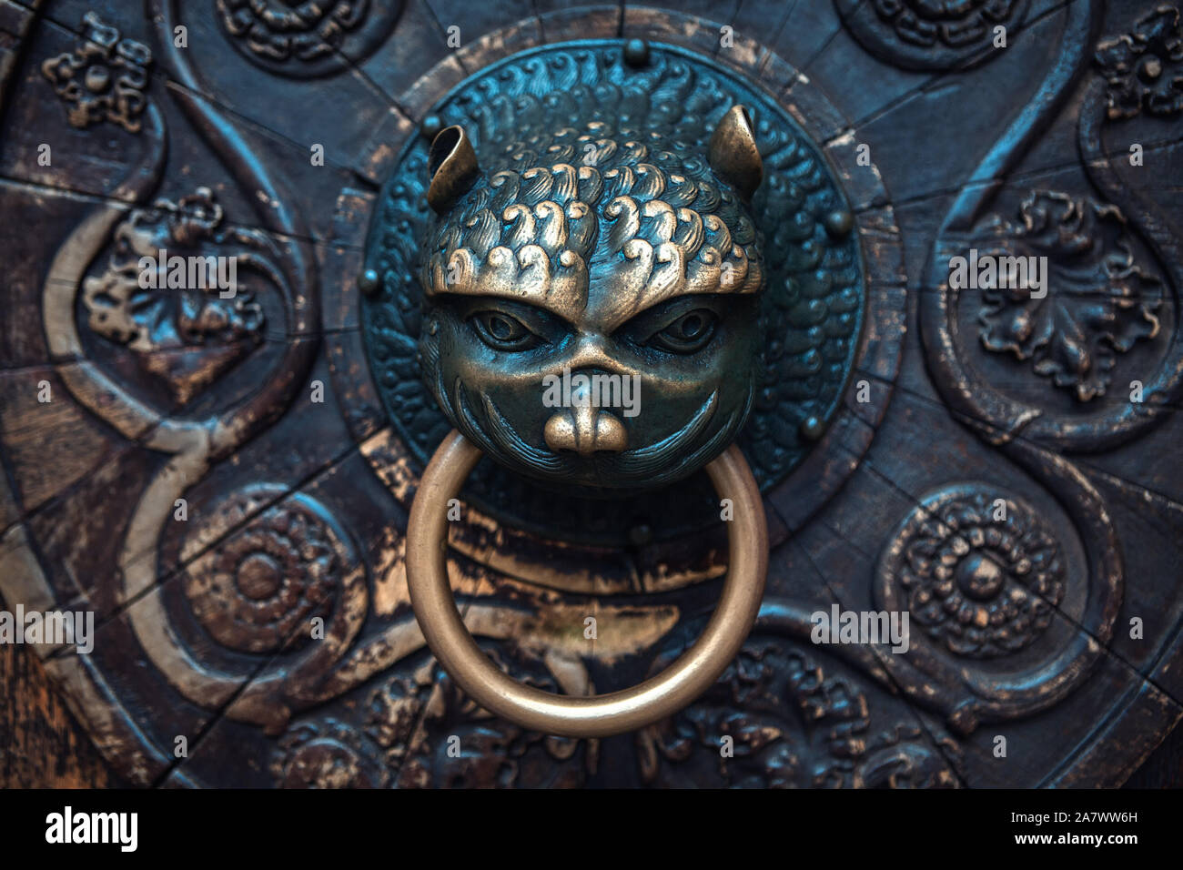 monster doorknob made by bronze Stock Photo - Alamy