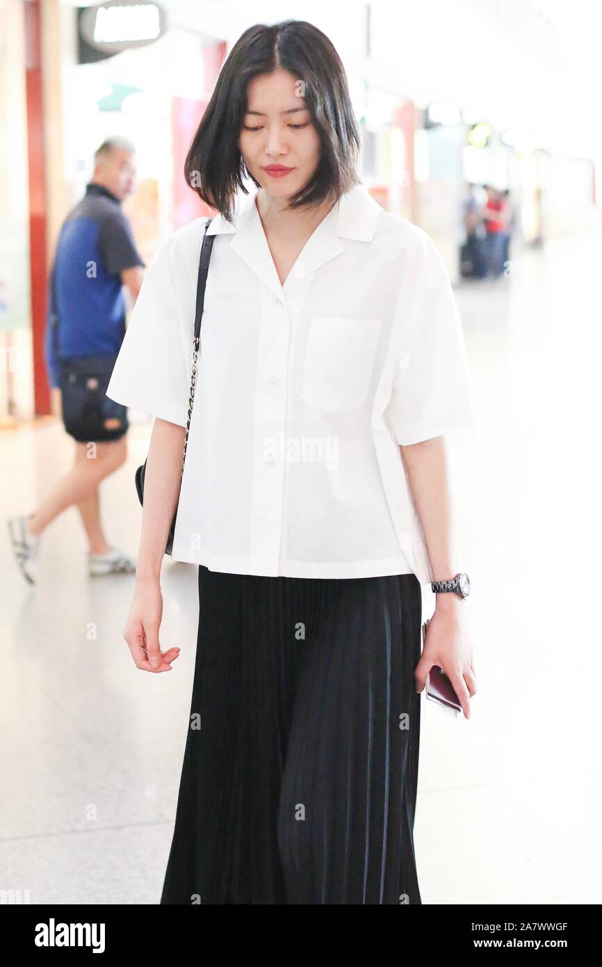 Chinese supermodel Liu Wen arrives at the Beijing Capital International ...