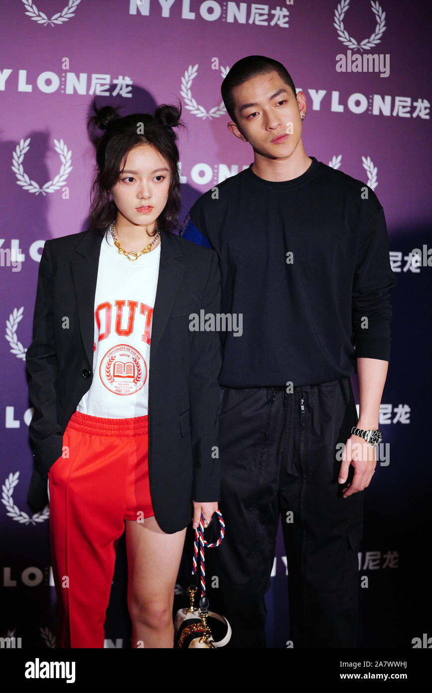Chinese actress Zhao Jinmai, left, and actor Qu Chuxiao attend a promotional event for Nylon in ...