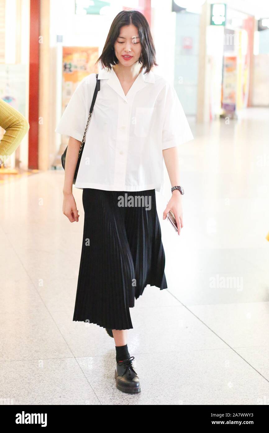Chinese supermodel Liu Wen arrives at the Beijing Capital International ...