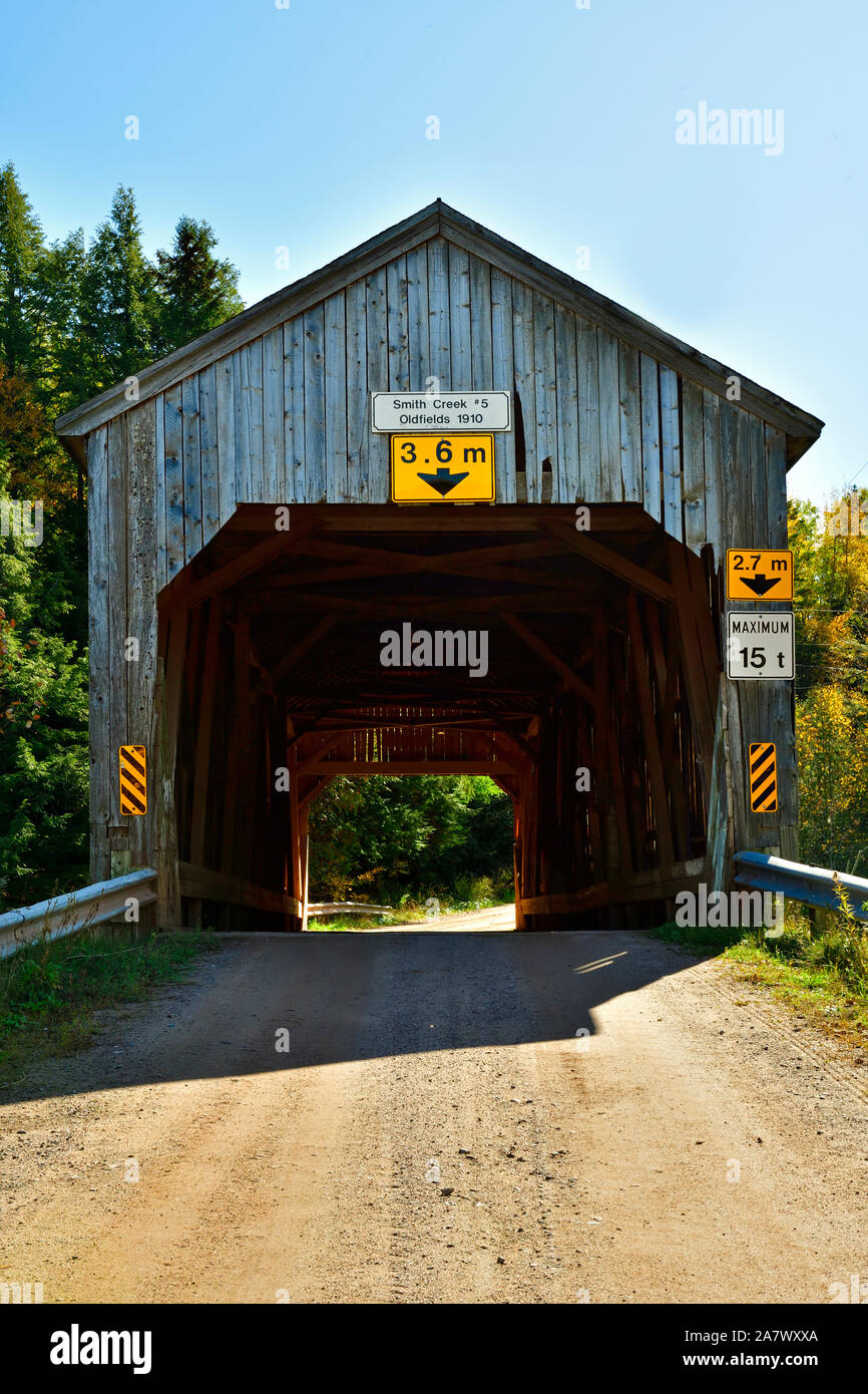 A vertical image of the Oldfield covered bridge built in 1910 crossing ...