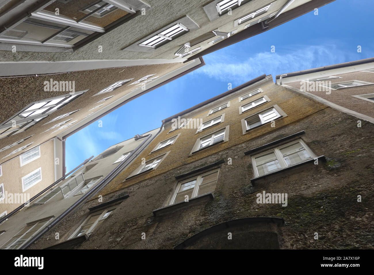 Dense standing buildings bottom up view in typical west european city ...