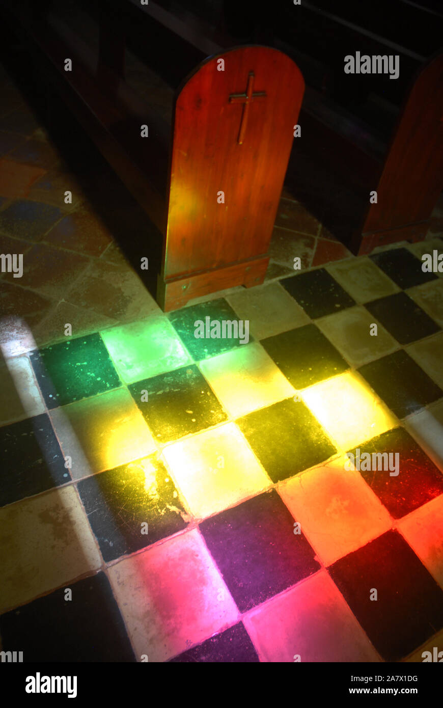 Coloured light reflected from stain glass windows, Baclayon Church ...