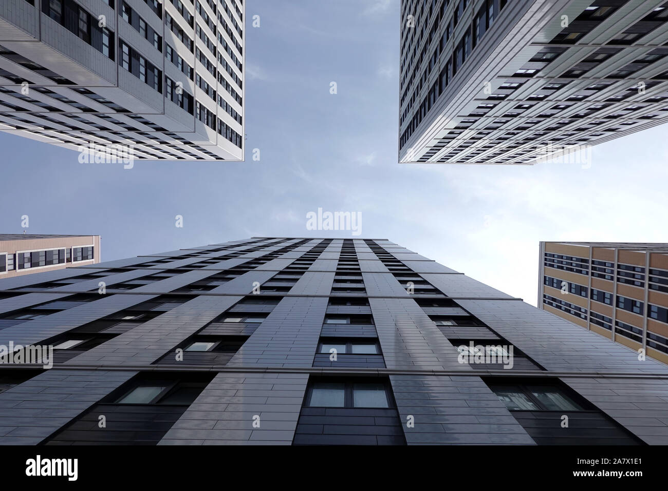 Walls of modern city skyscraper buildings with many windows in business ...