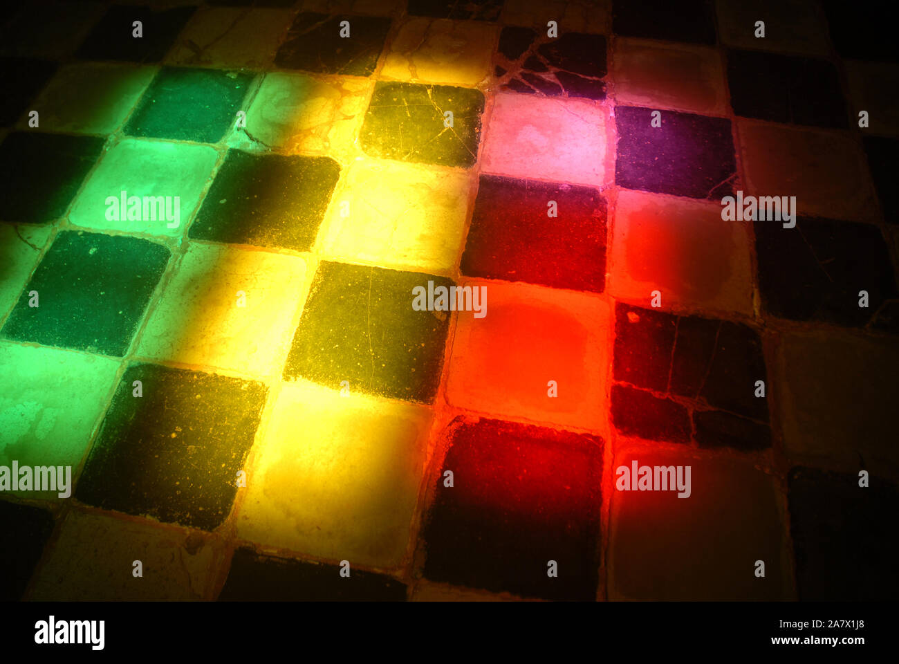 Coloured light reflected from stain glass windows, Baclayon Church ...