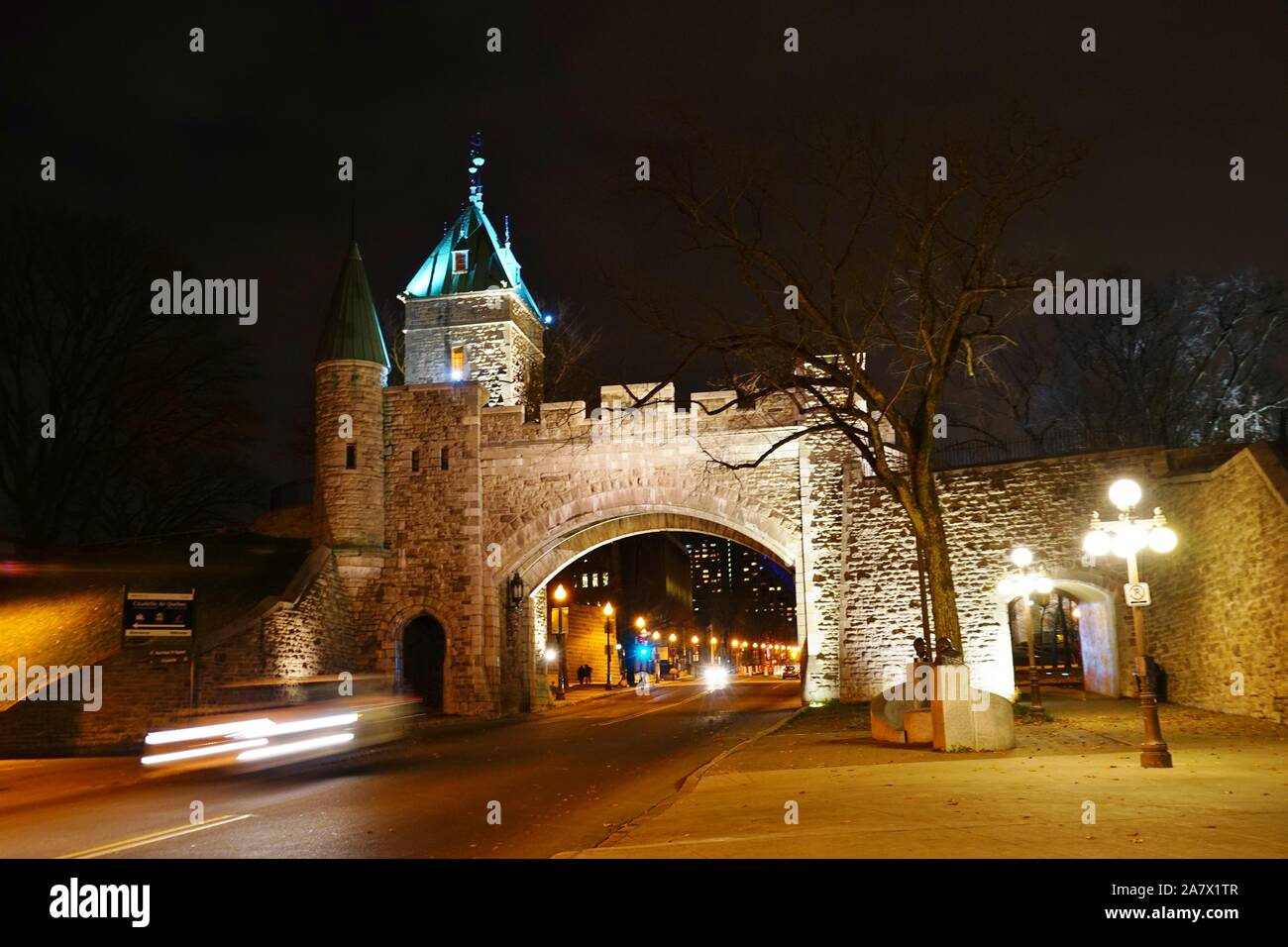 QUEBEC CITY, CANADA -1 NOV 2019- Night view of the landmark Porte Saint ...