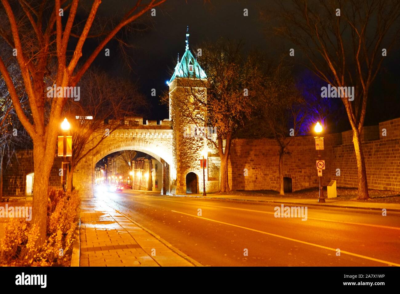 QUEBEC CITY, CANADA -1 NOV 2019- Night view of the landmark Porte Saint ...