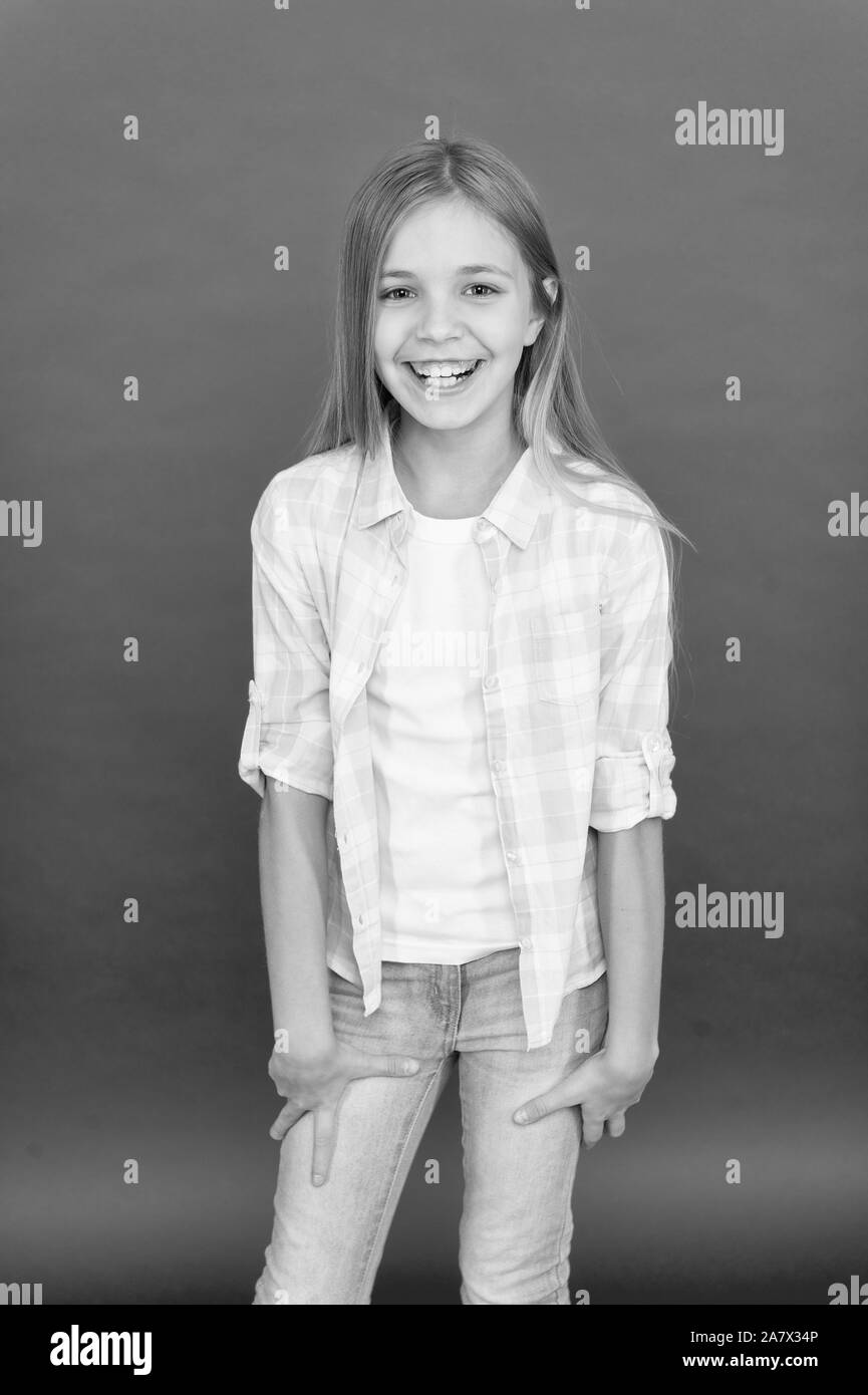 Shy beauty. Happy childhood. Girl cute child smiling face expression on ...