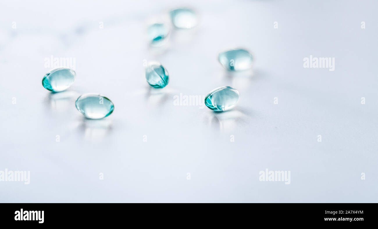 Pharmaceutical, branding and science concept - Blue pills for healthy ...