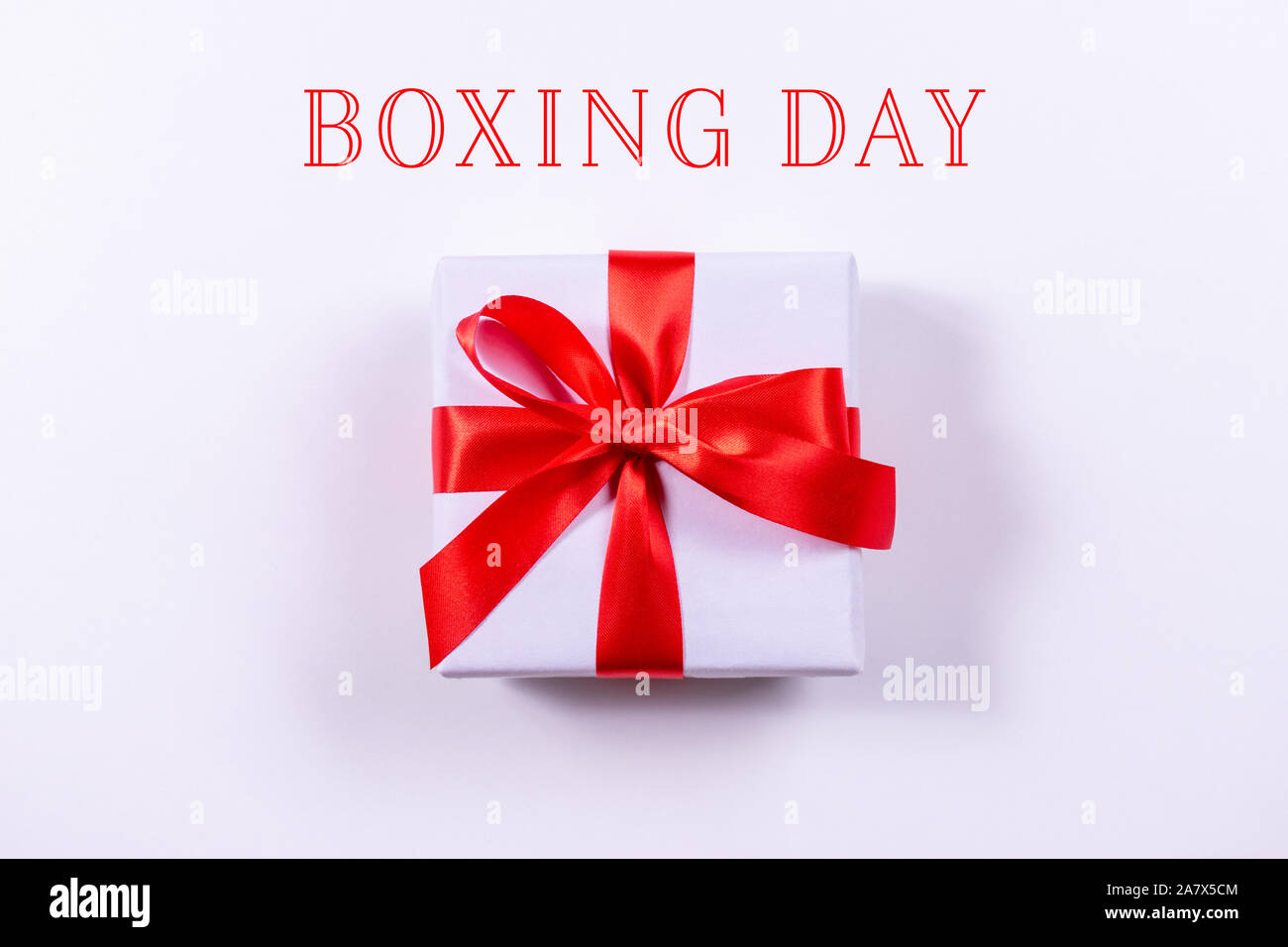 Christmas gift with red bow on white background. Xmas template. Happy ...