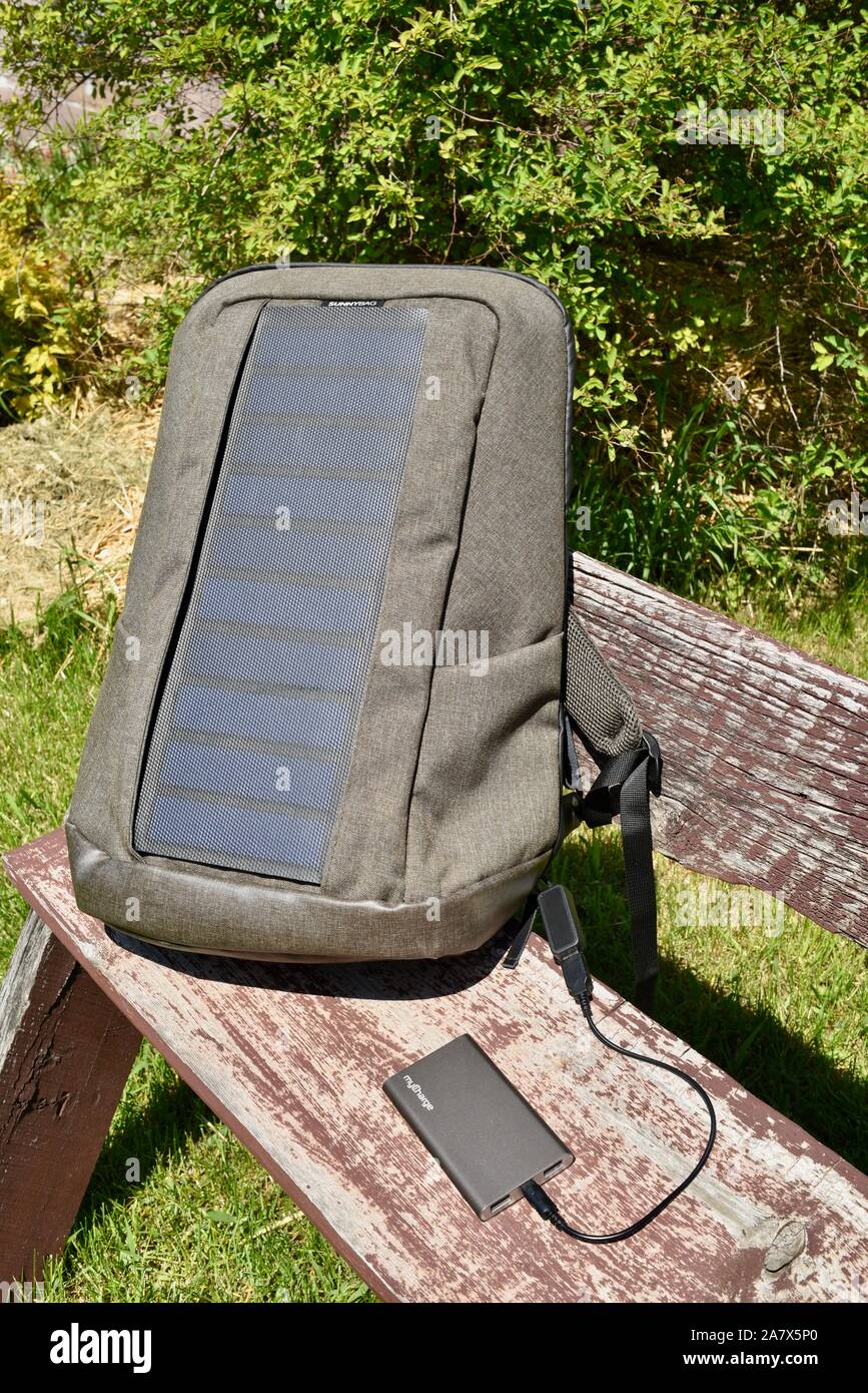 Sunnybag Iconic Solar Backpack, in sun, recharging battery, cell phones ...