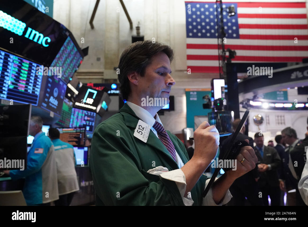 New York, NY, USA. 4th Nov, 2019. Traders work on the floor at the ...