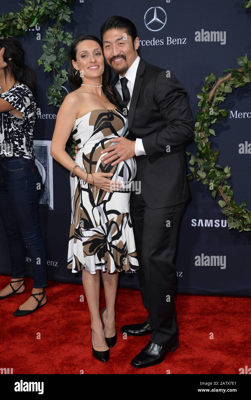 LOS ANGELES, CA - JUNE 10, 2015: Brian Tee & wife Mirelly Taylor at the ...
