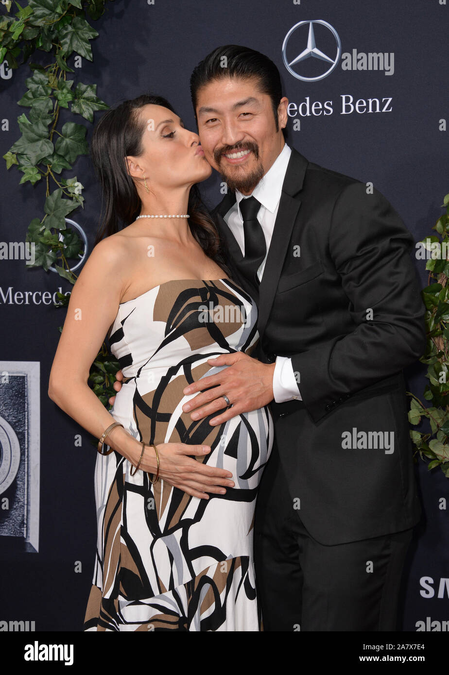 LOS ANGELES, CA - JUNE 10, 2015: Brian Tee & wife Mirelly Taylor at the ...