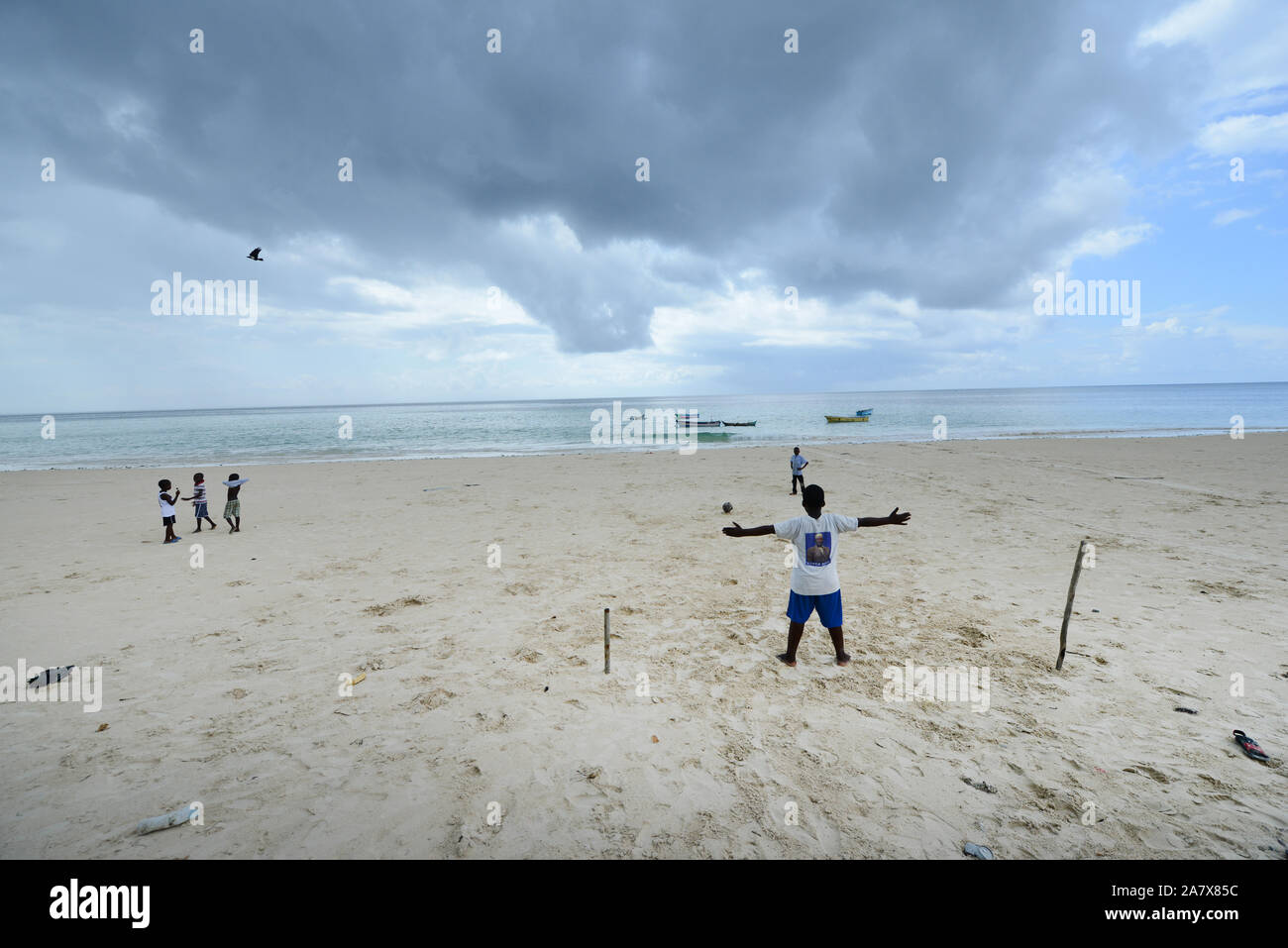 Comoran boys playing football on Mitsamiouli beach in Comoros Stock ...