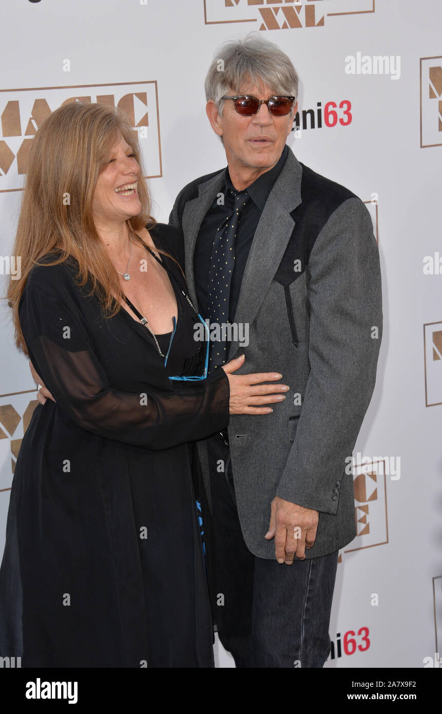 LOS ANGELES, CA - JUNE 25, 2015: Eric Roberts & wife at the world ...