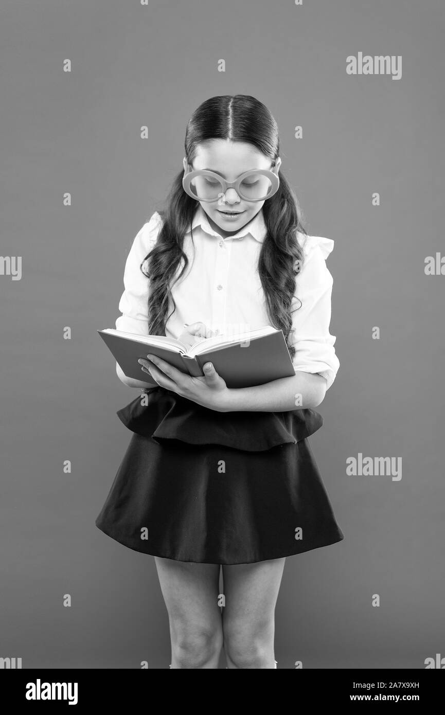 Child uniform bookshelf Black and White Stock Photos & Images - Alamy