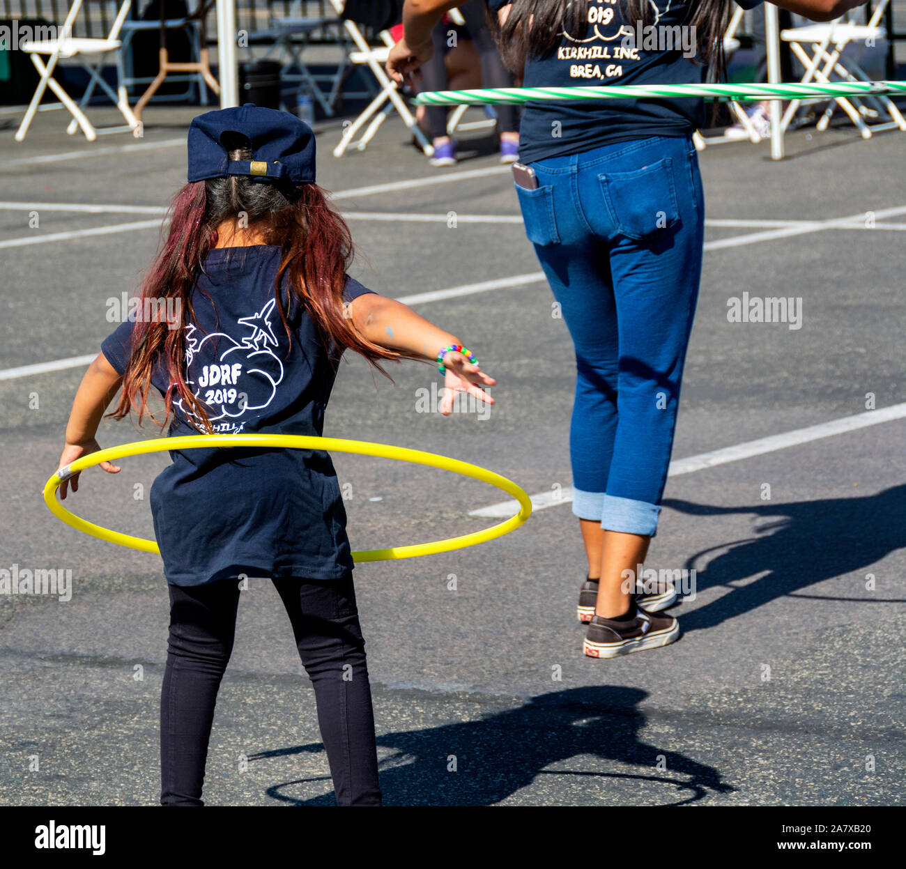 Anaheim, CA / USA - Nov 3, 2019: Cute little girl and a woman playing ...