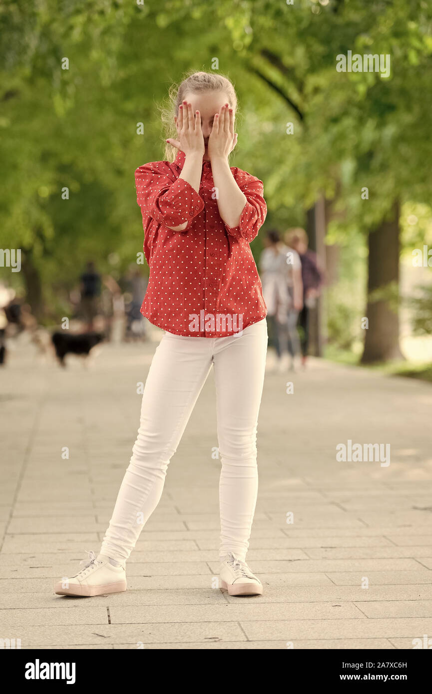 Hide and seek fun. Happy hiding game outdoors. Hide and seek urban ...