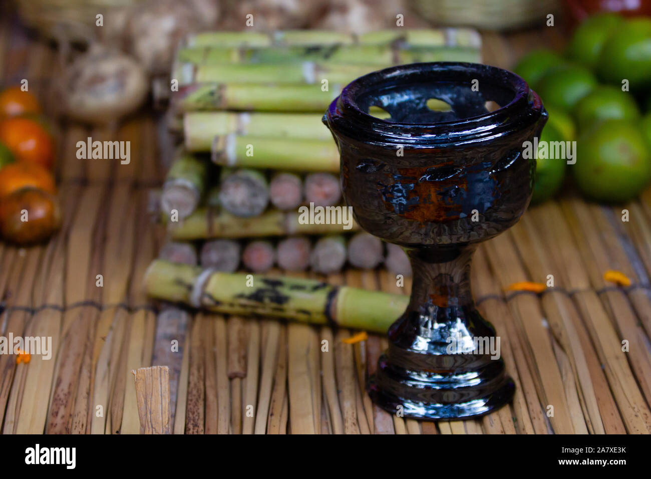 a handmade mexican clay pot for burning incense for day of the dead, on ...