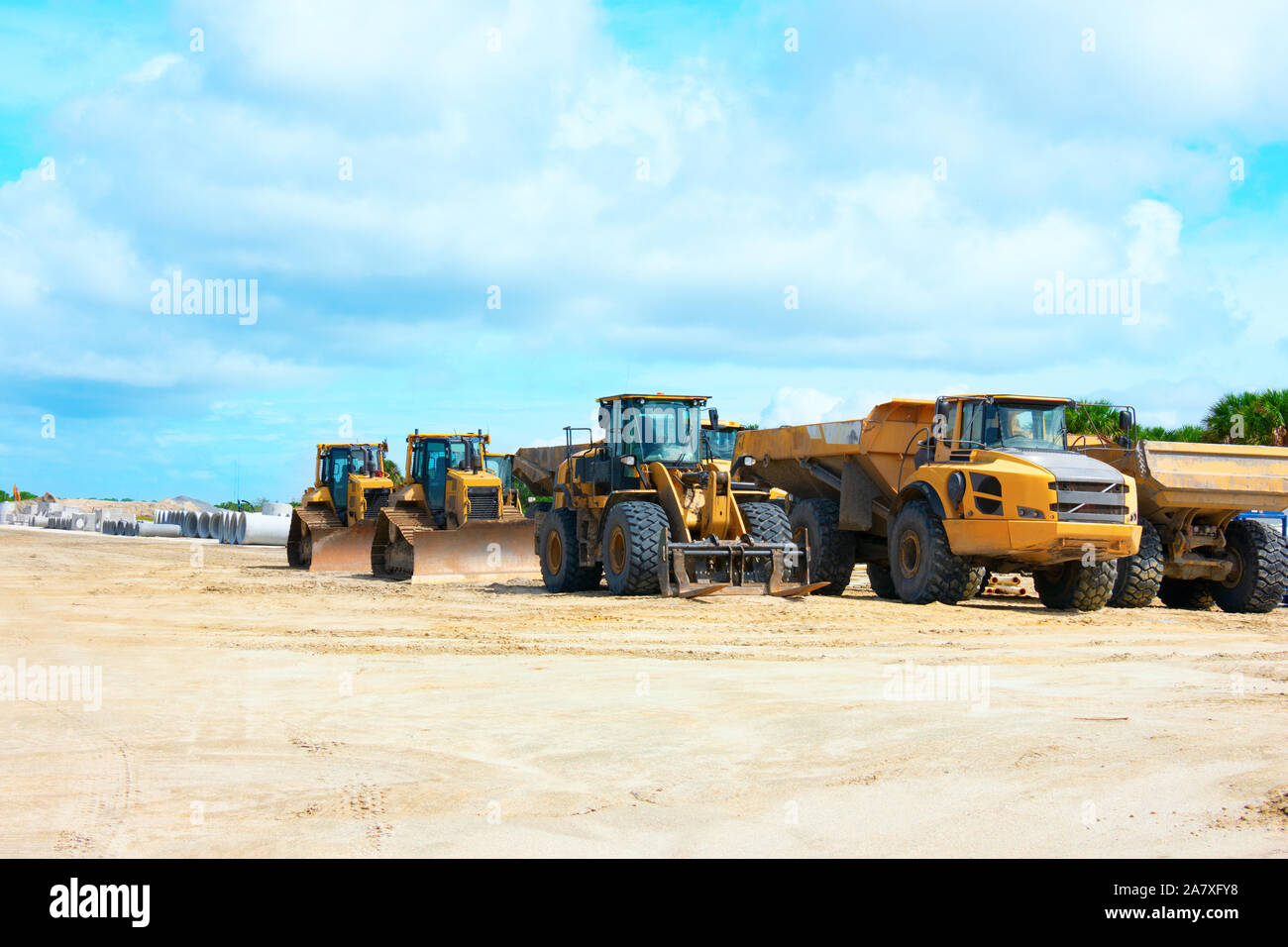 Construction site tractors dump trucks hi-res stock photography and ...