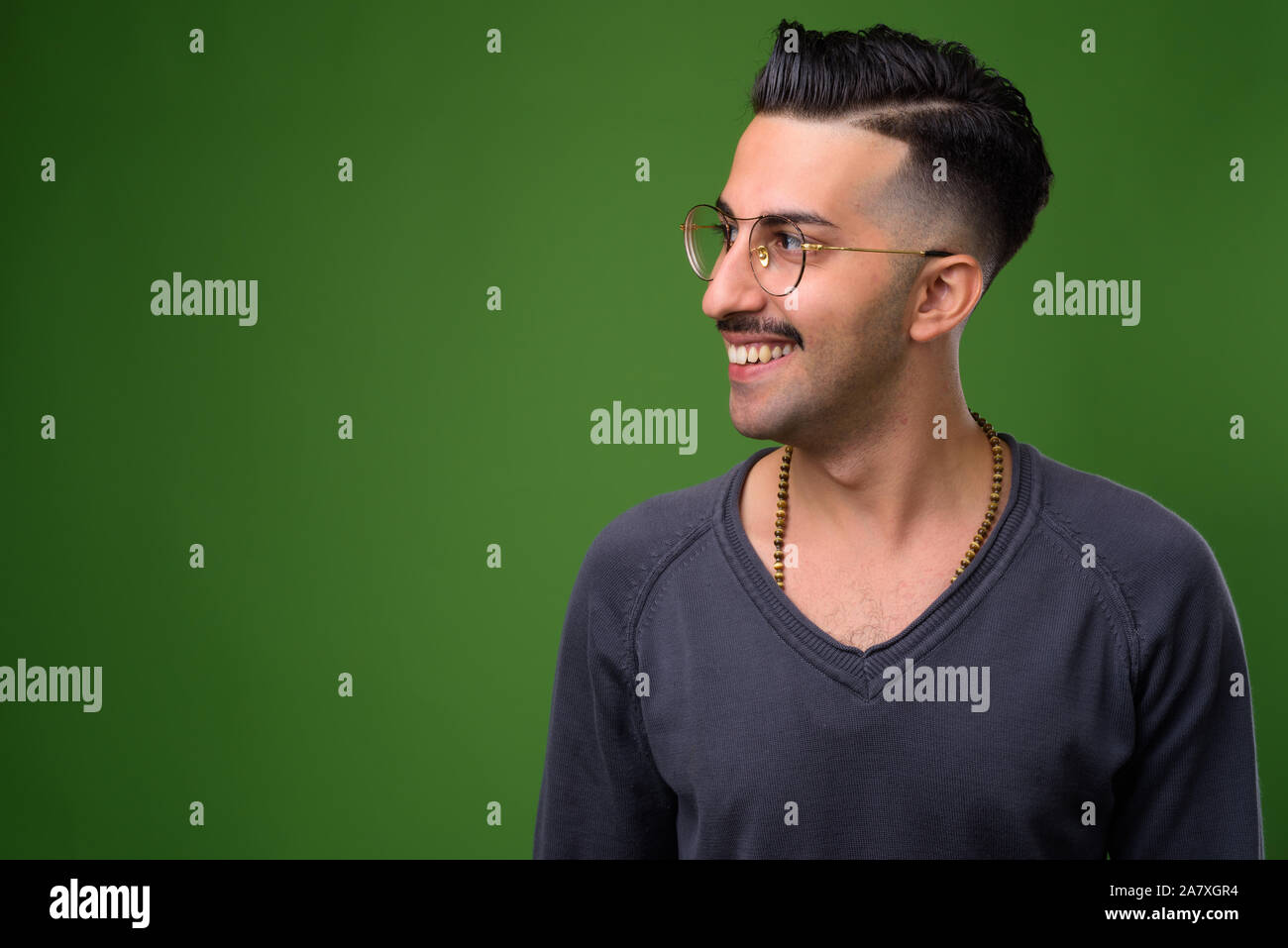 Profile view young happy persian hi-res stock photography and images ...