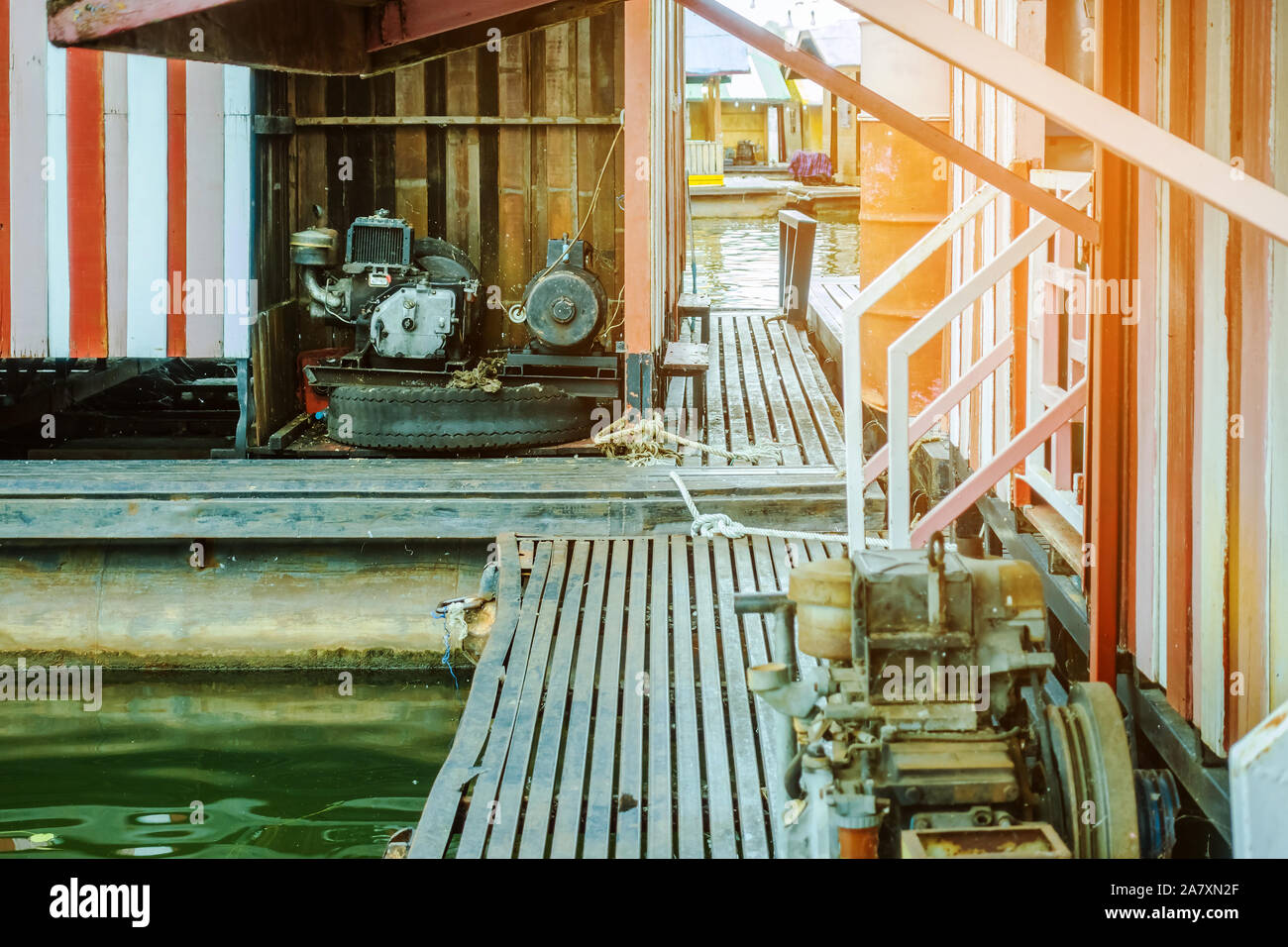 The old electricity generator for floating wooden raft house by using ...