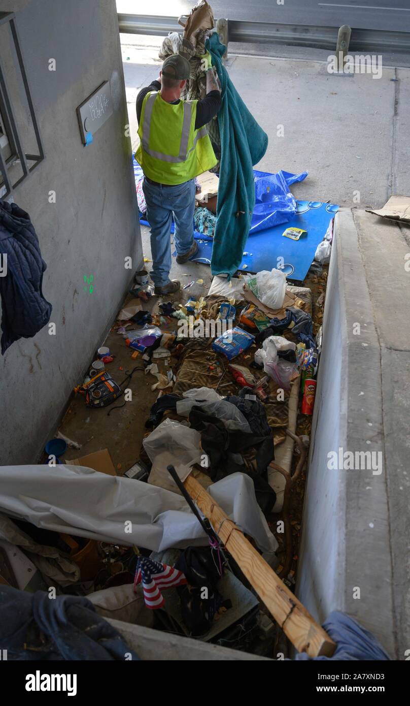Department of Transportation contractor cleans up a homeless camp under ...