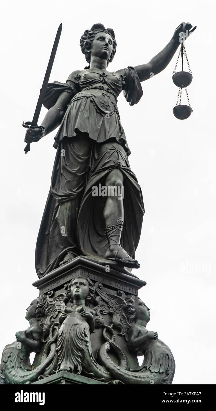 Justice Statue with Sword and Scale in Frankfurt/Main isolated on white ...