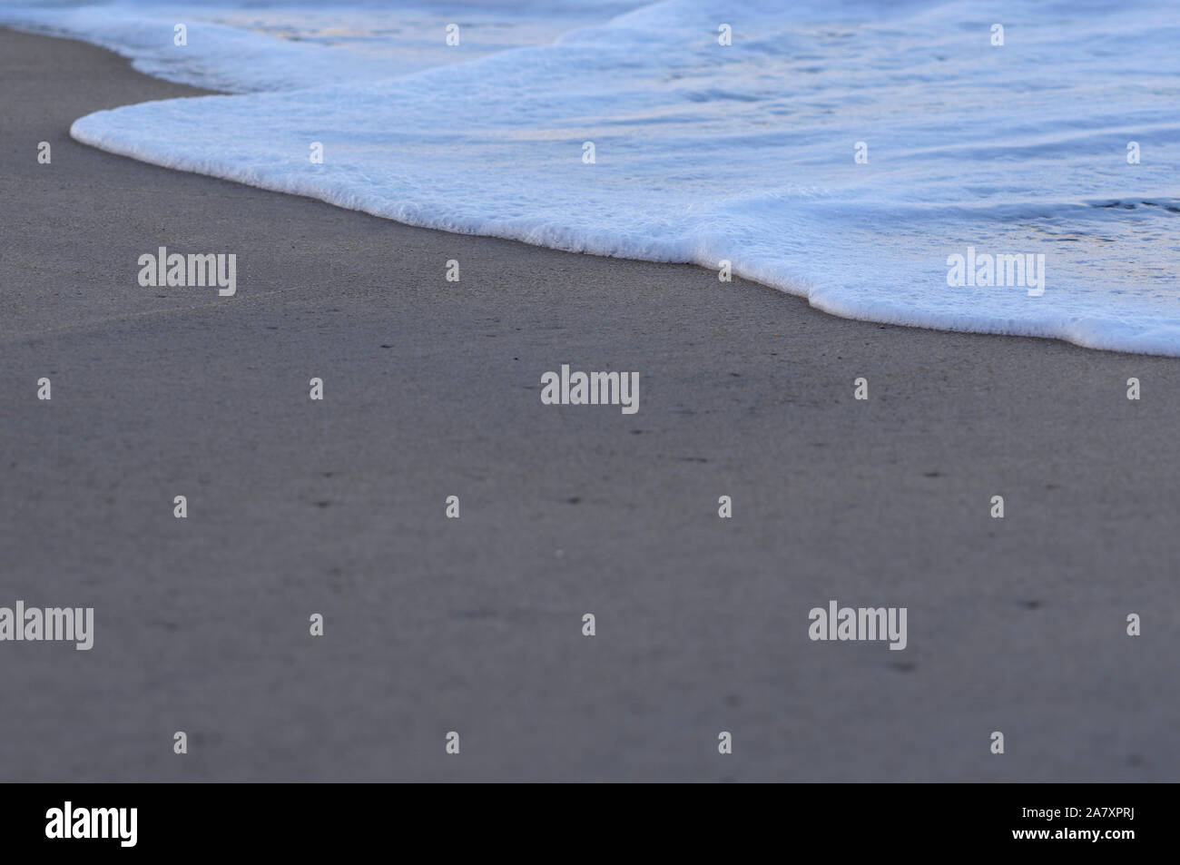 Sea wave bubble foam on beach hi-res stock photography and images - Alamy