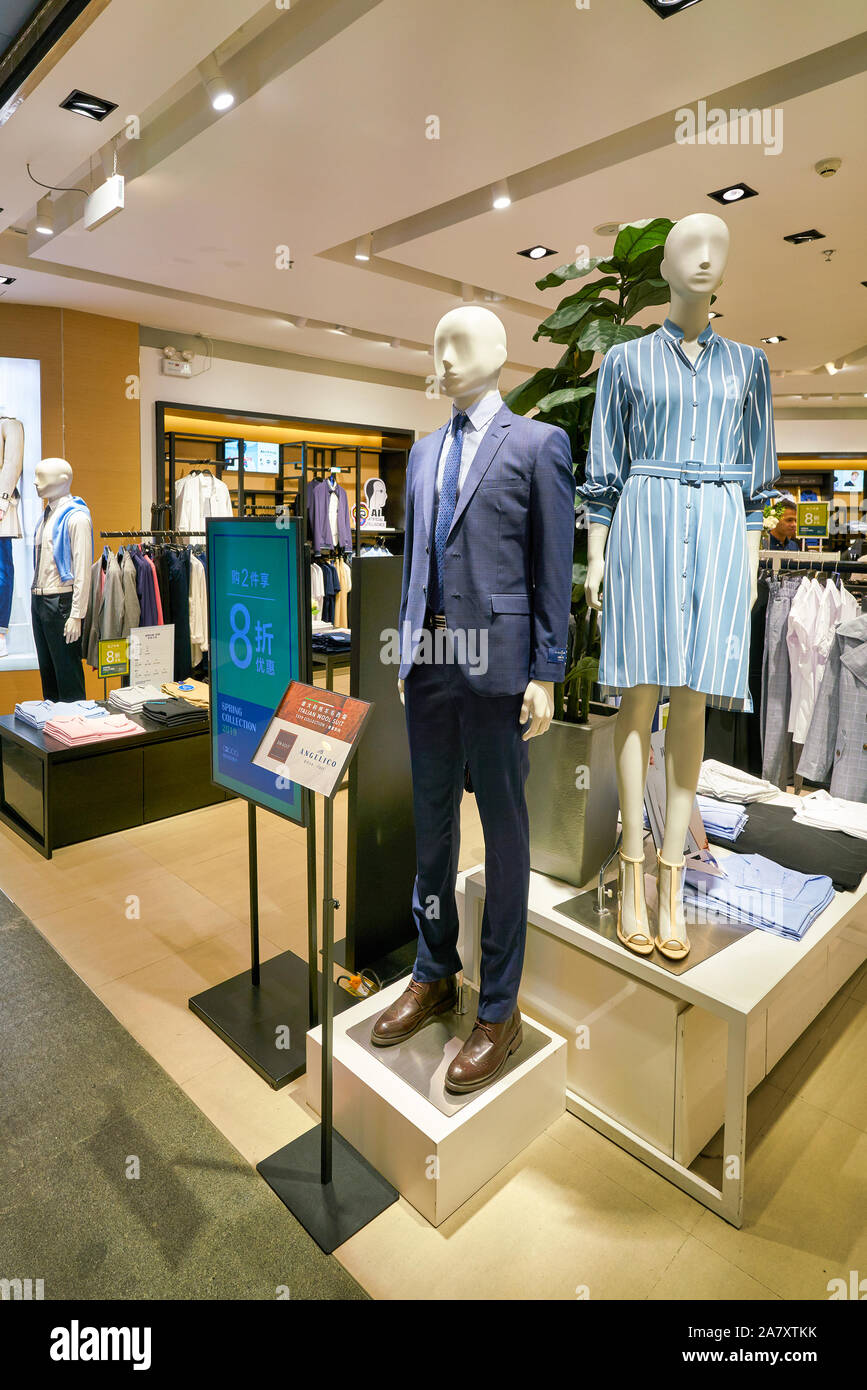 SHENZHEN, CHINA - APRIL 09, 2019: clothes on display at G2000 store in ...