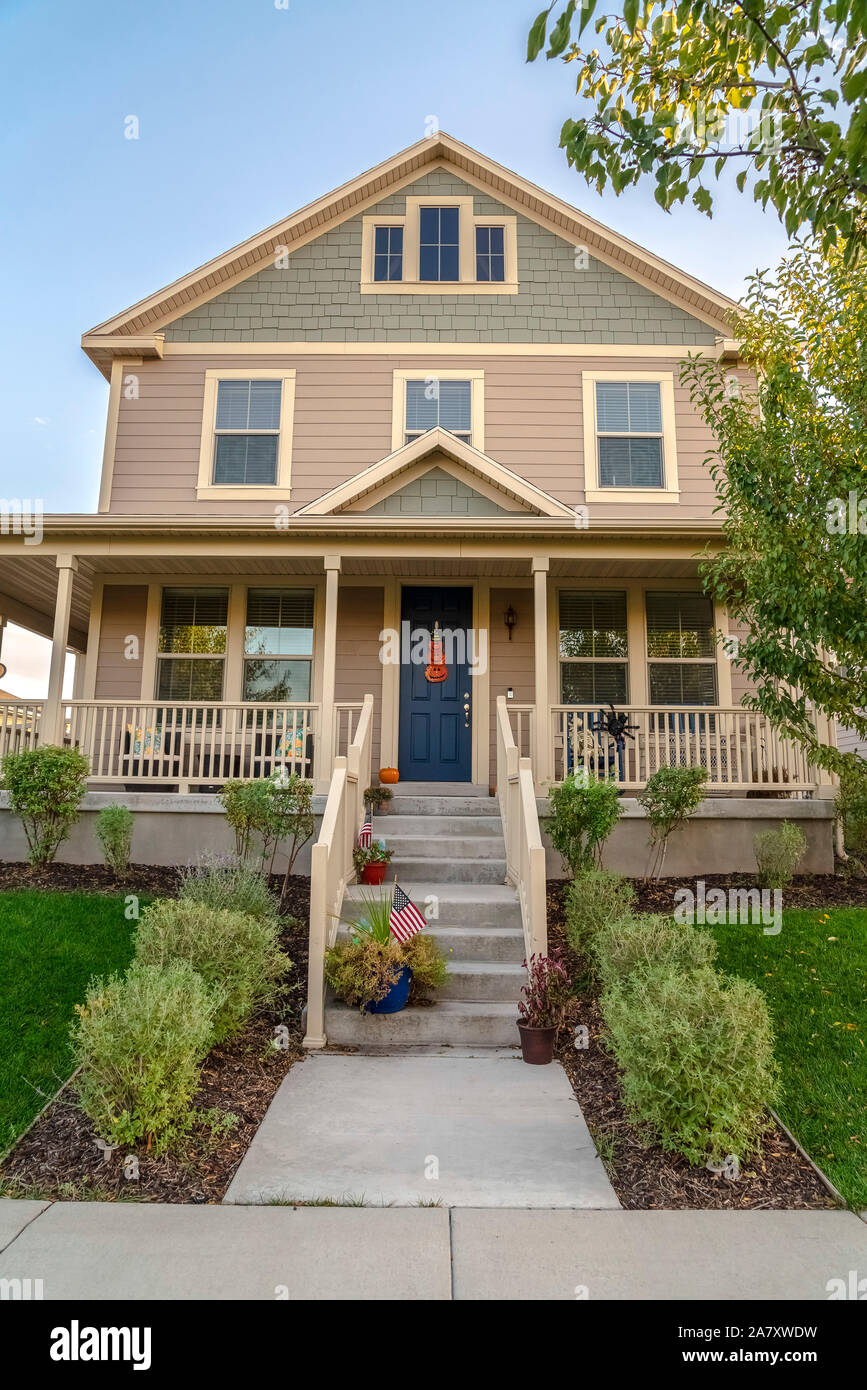 Pathway and steps leading to a double storey house Stock Photo - Alamy