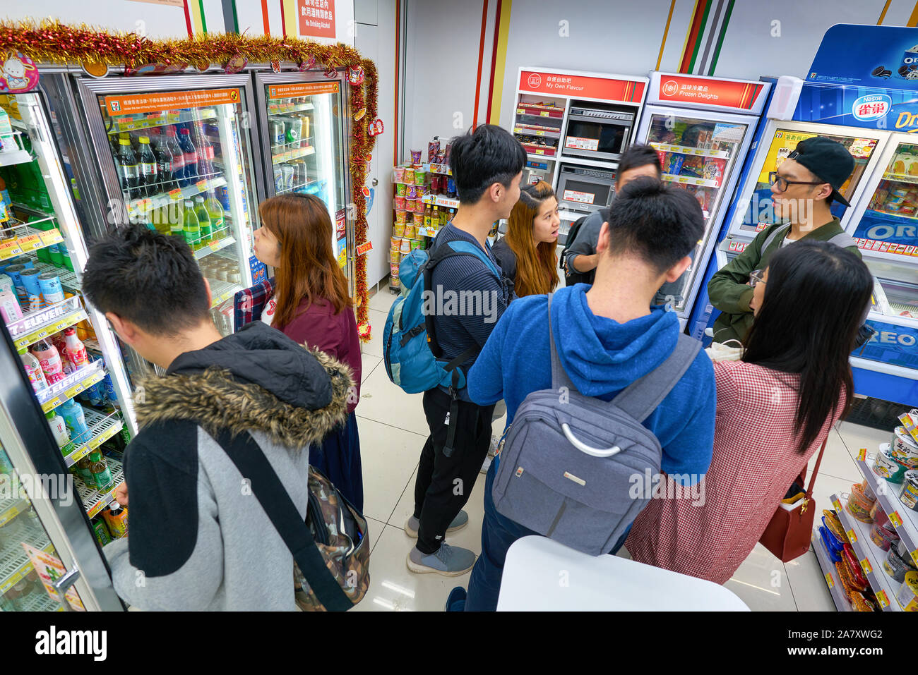 HONG KONG, CHINA - CIRCA JANUARY, 2019: people at 7-eleven convenience store in Hong Kong Stock ...