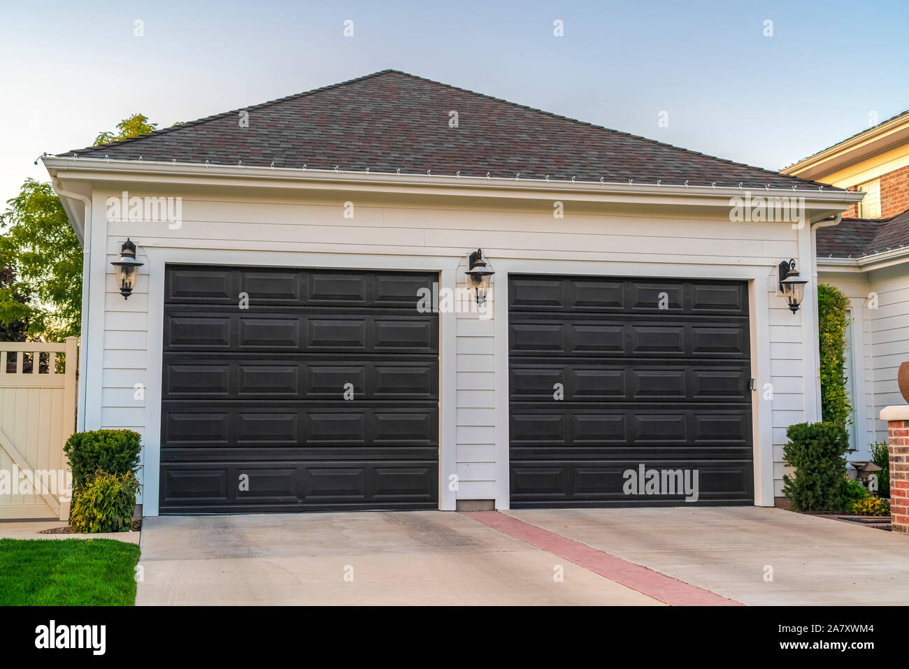 Double garage unit attached to a suburban house Stock Photo - Alamy