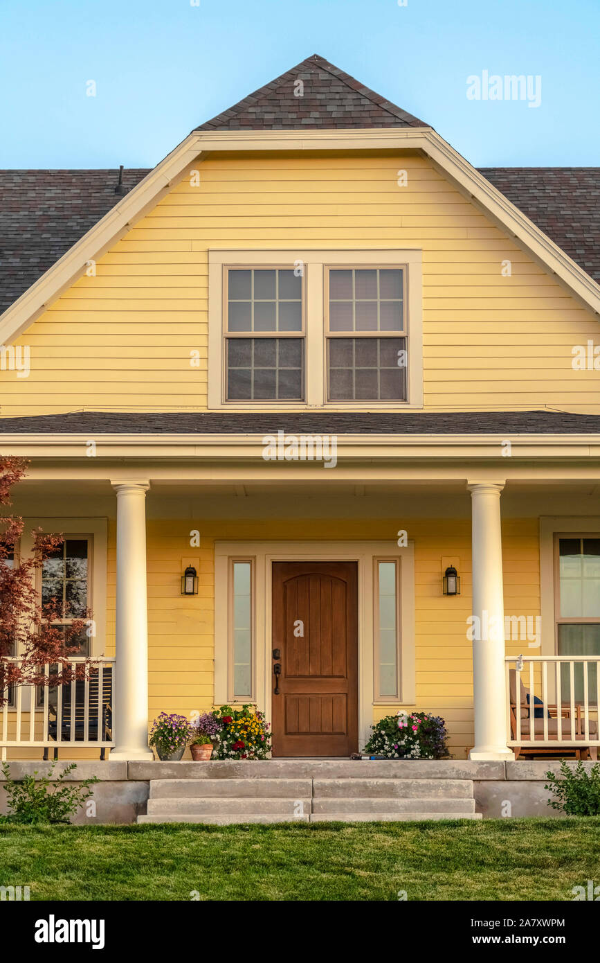 Traditional timber clad front house facade near sunset Stock Photo - Alamy