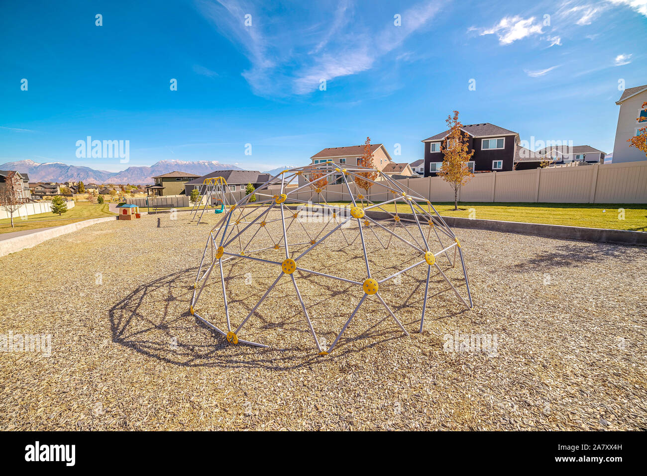 Close up on a kids climbing dome in a playground Stock Photo - Alamy