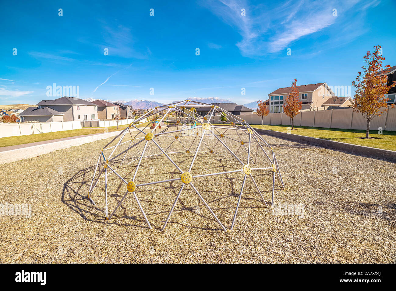 Metal climbing dome with nets in a playground Stock Photo - Alamy