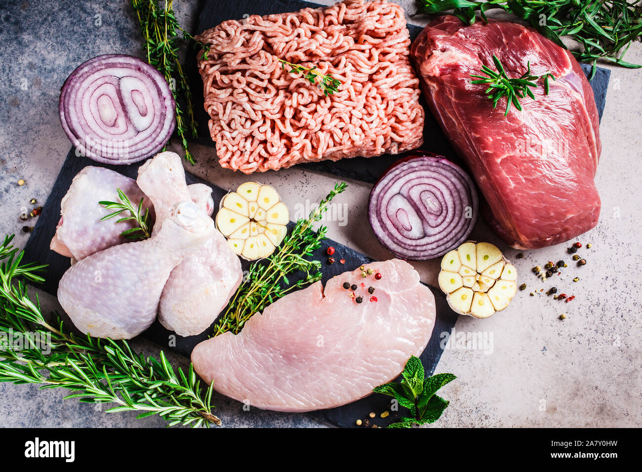 Carnivore diet concept. Raw meat of chicken, beef, minced meat and ...