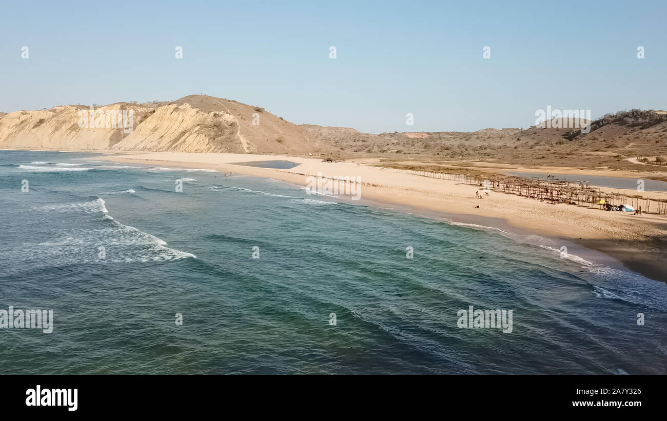 Aerial drone view of surfers beach, calm water and geology and typical ...