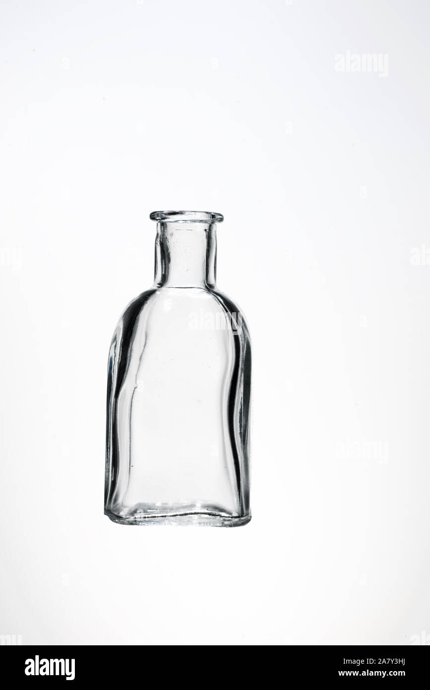Glass bottle and white background Stock Photo - Alamy