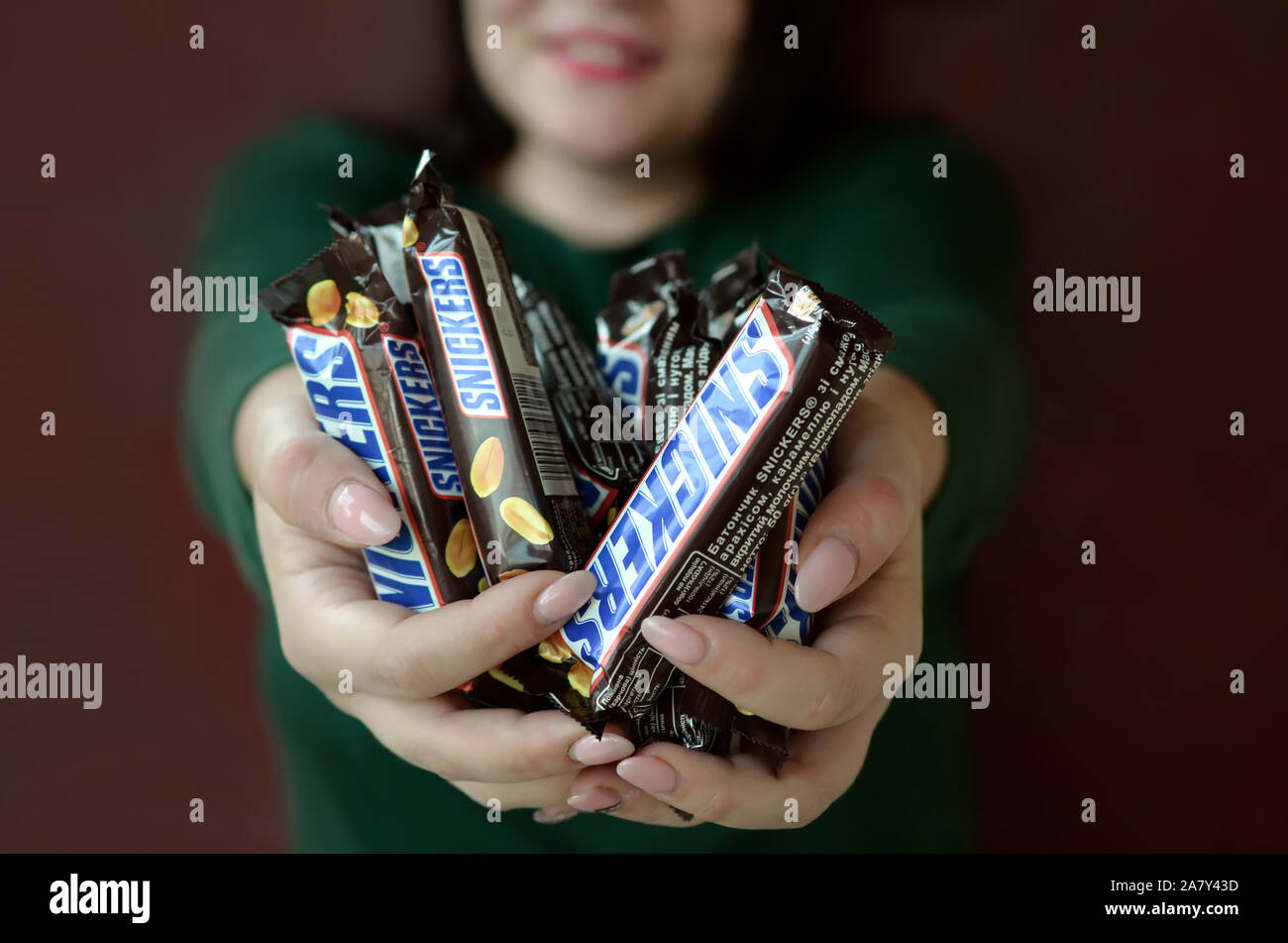 KHARKOV, UKRAINE - OCTOBER 8, 2019: A young caucasian brunette girl ...