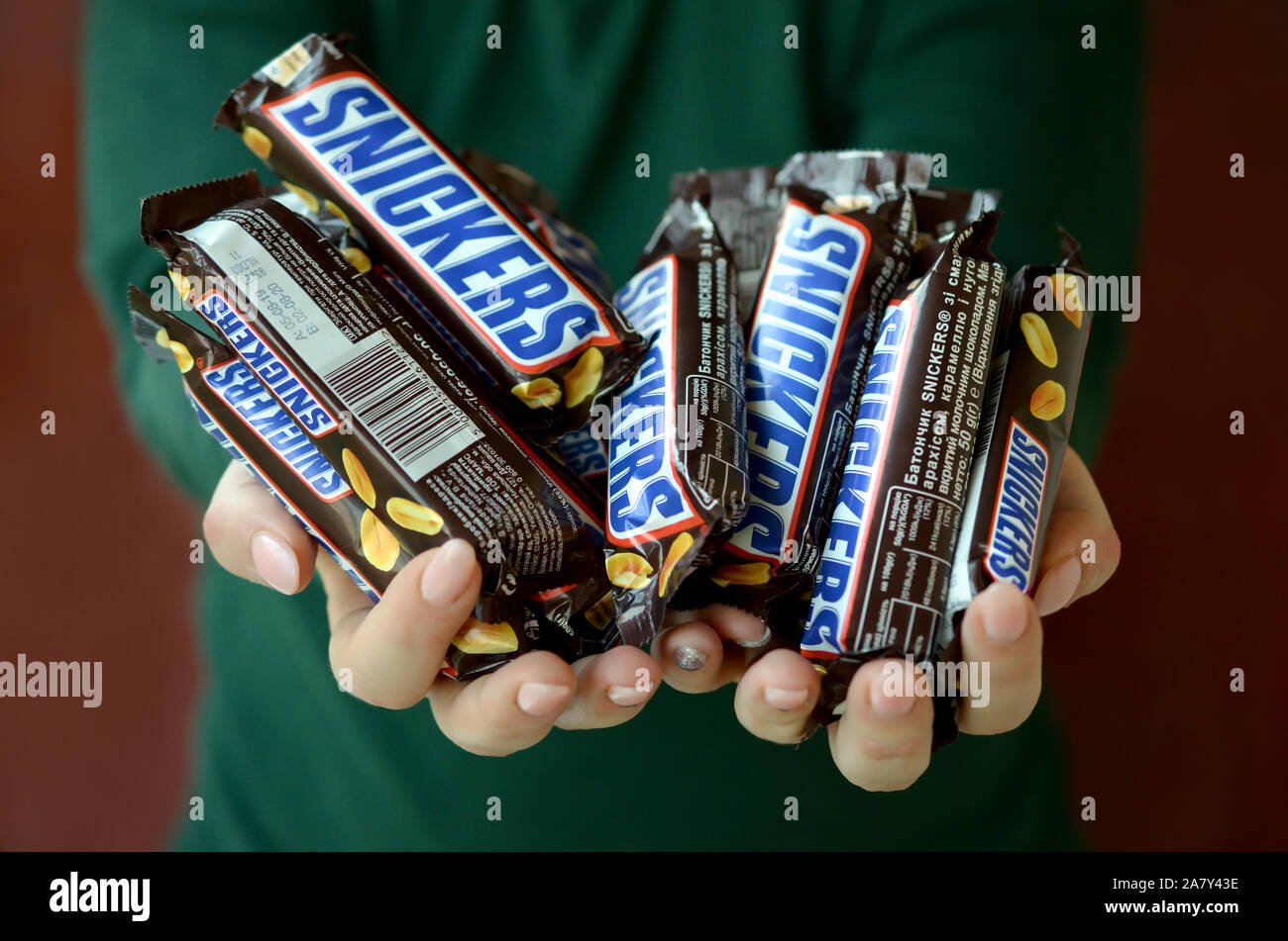 KHARKOV, UKRAINE - OCTOBER 8, 2019: A young caucasian brunette girl ...