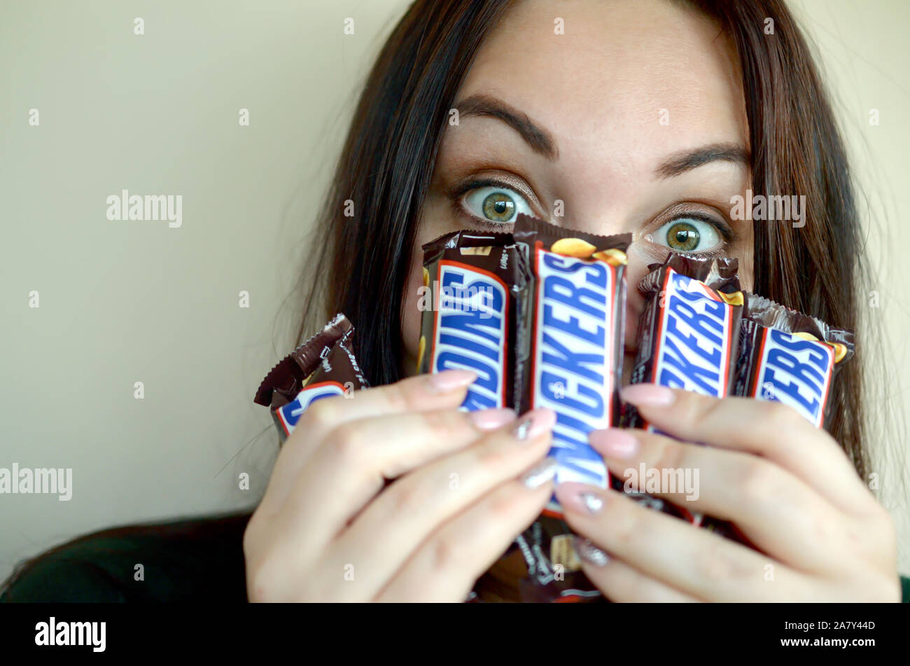 KHARKOV, UKRAINE - OCTOBER 8, 2019: A smiling young caucasian brunette ...