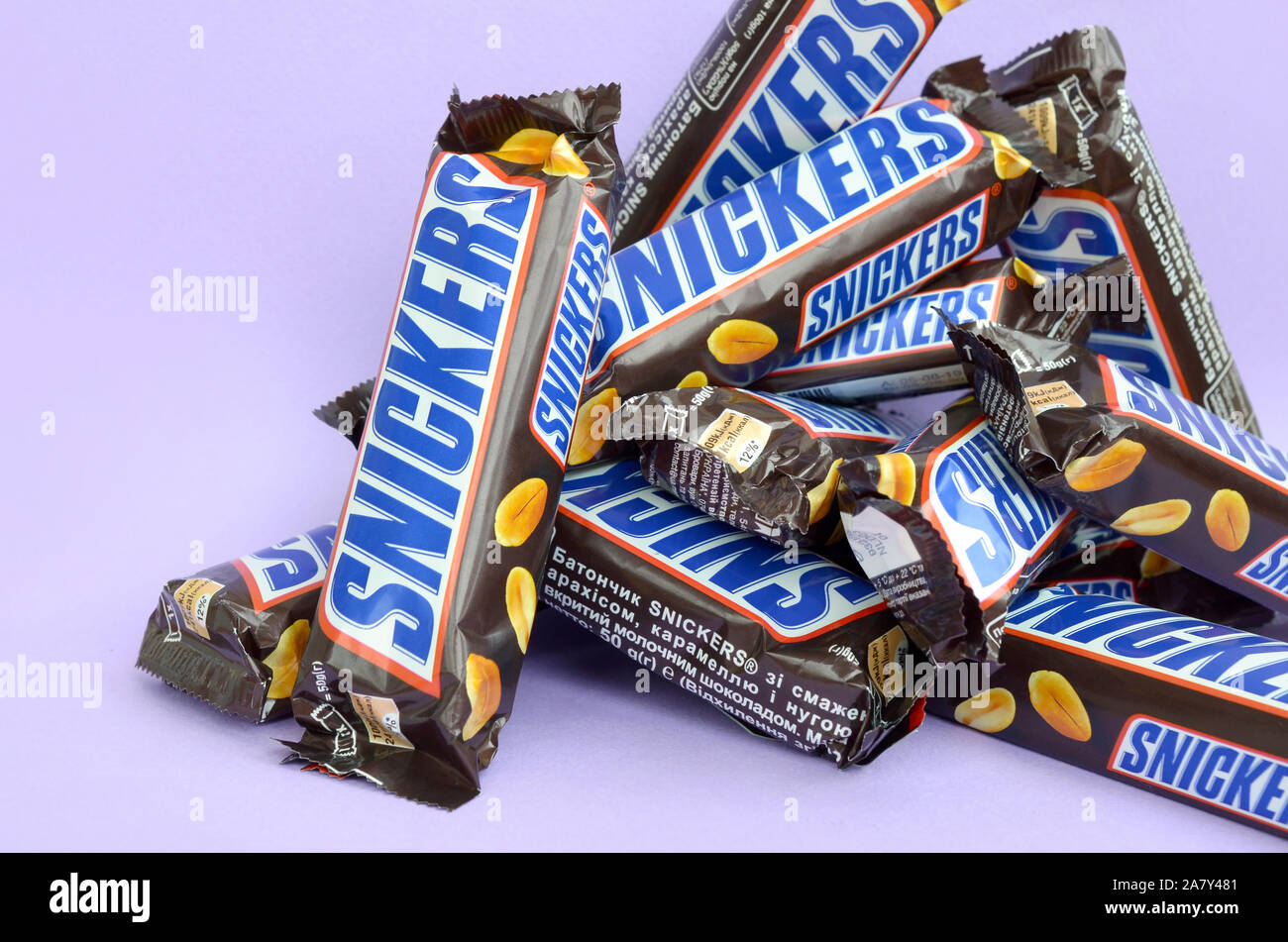KHARKOV, UKRAINE - OCTOBER 2, 2019: Many Snickers chocolate bars lies ...